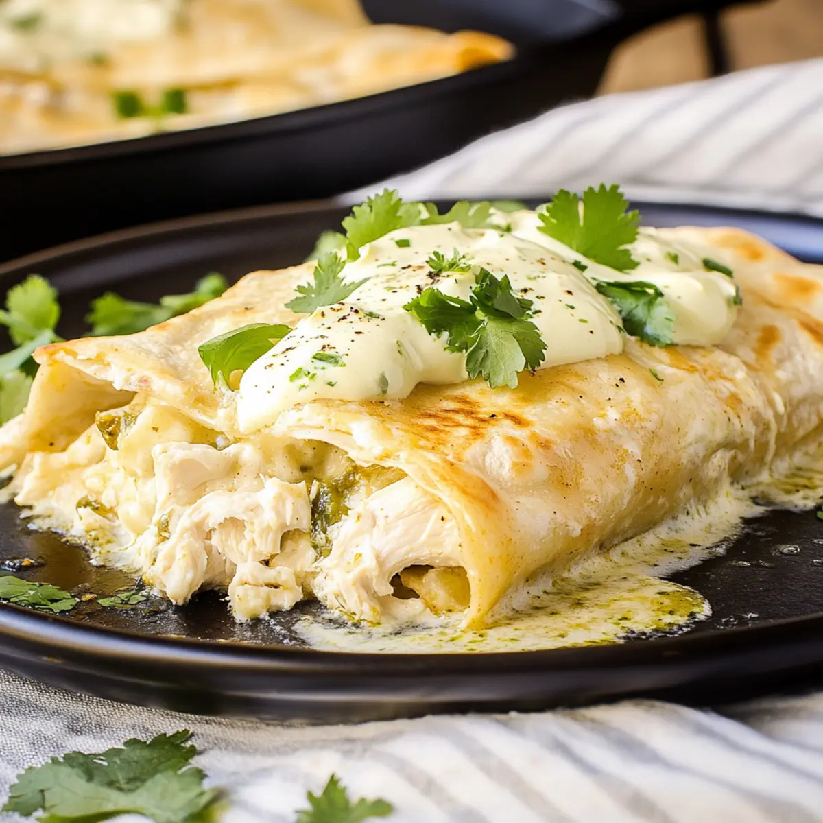 Easy White Chicken Enchiladas with Green Chili Sour Cream Sauce